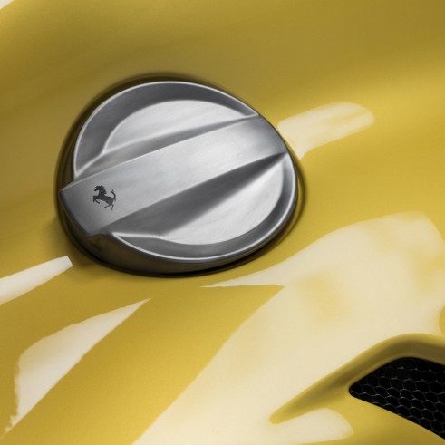 Titanium fuel filler flap